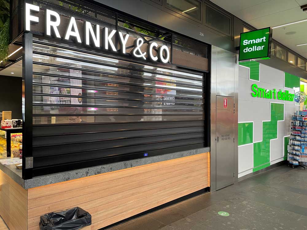 Commercial security shutters with optional overhead pelmet hoods ...