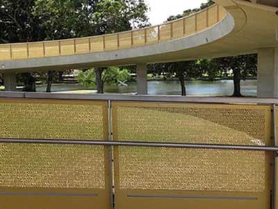 Perforated panels on new Hassell-designed bridge over Anzac Parade ...