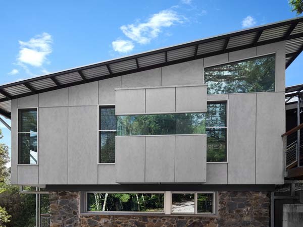 Barestone cladding provides weather protection to rainforest home ...