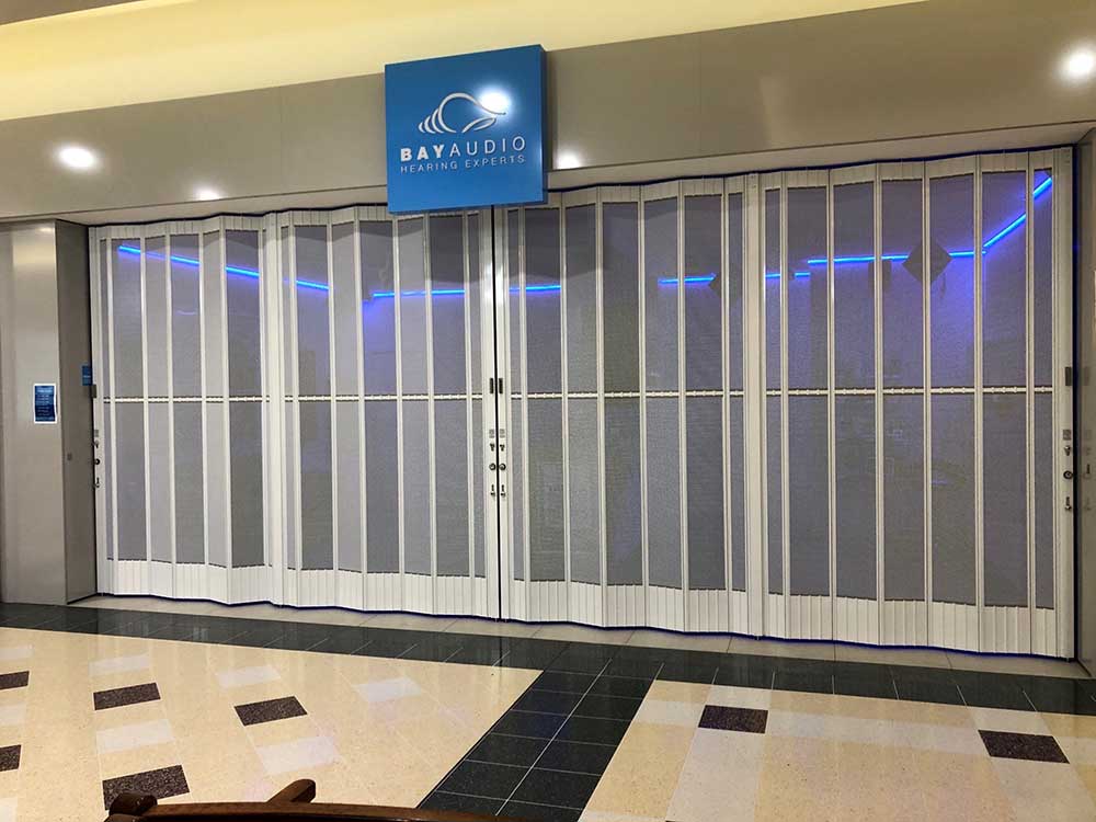 Popular stackable commercial doors secure Bay Audio stores across ...