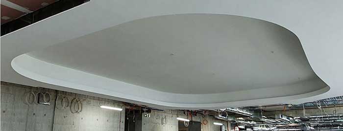 Custom ceiling and wall systems engineered for challenging Wesley Place ...