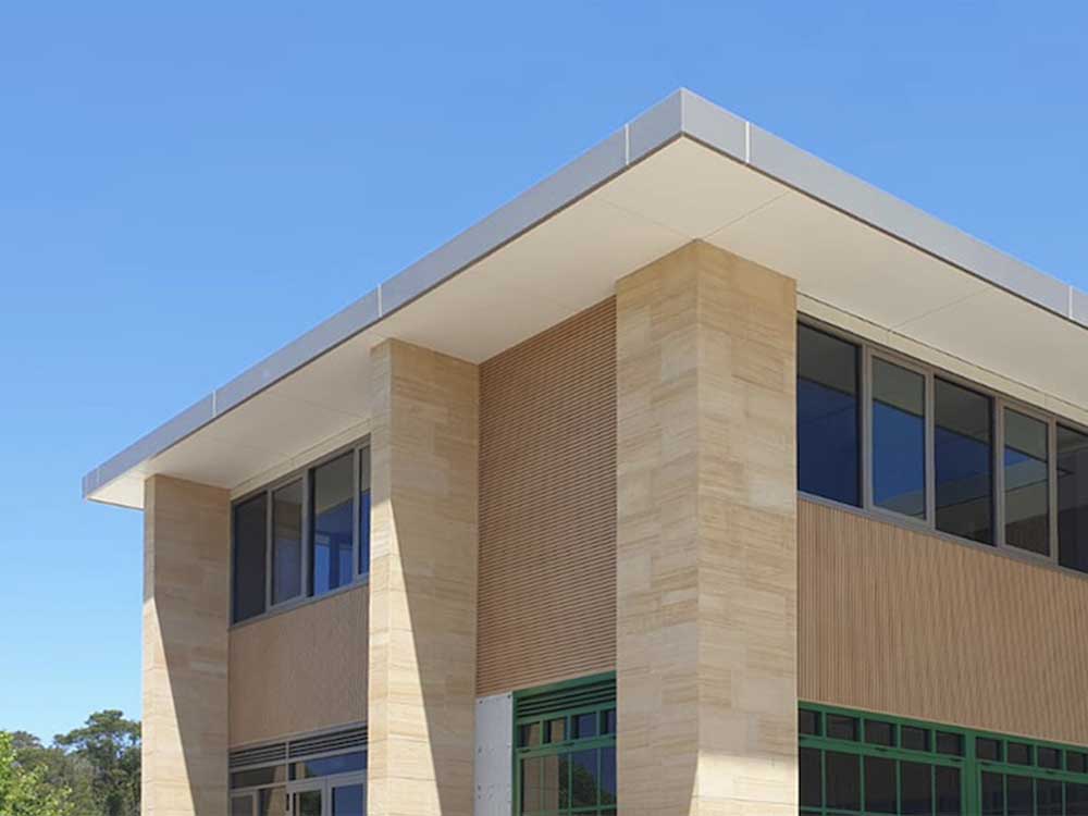 Alumate woodgrain castellation cladding a perfect fit for Cedar College ...