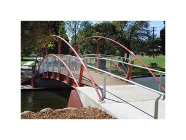 Curved I-beam footbridge installed by Landmark Products at Lake Annand ...