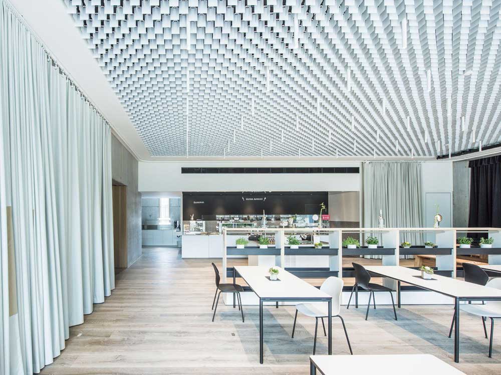 LIVA open-cell ceiling sets the tone visually at EWS Schoenau’s ...
