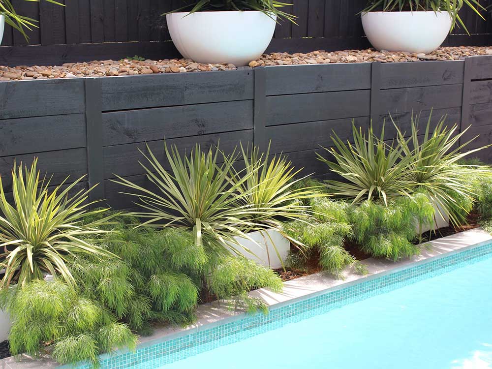 Building retaining walls with steel posts for long-lasting performance ...