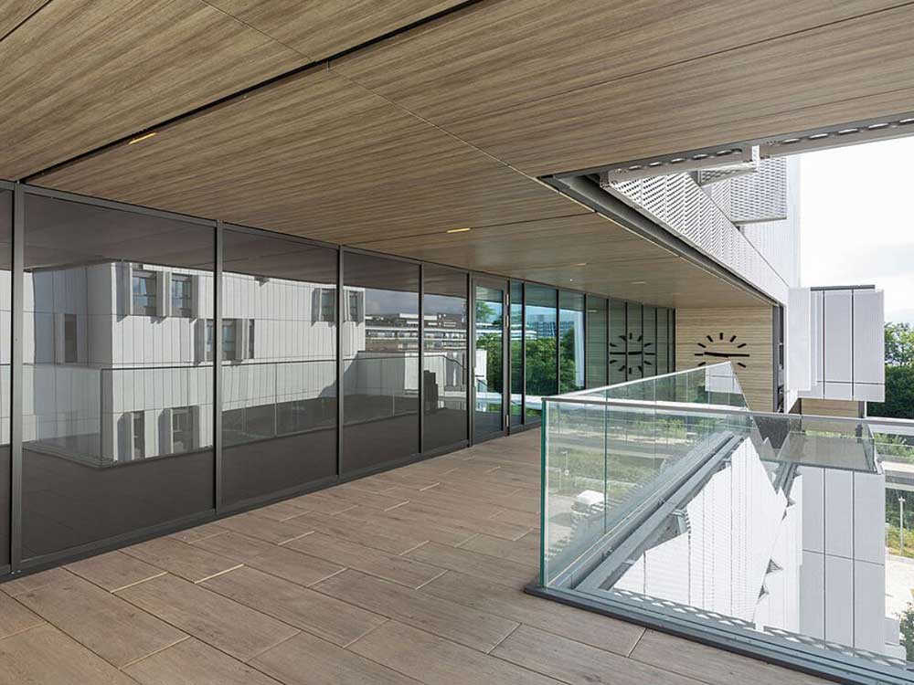 durlum rectangular metal panels on ceilings create attractive students ...