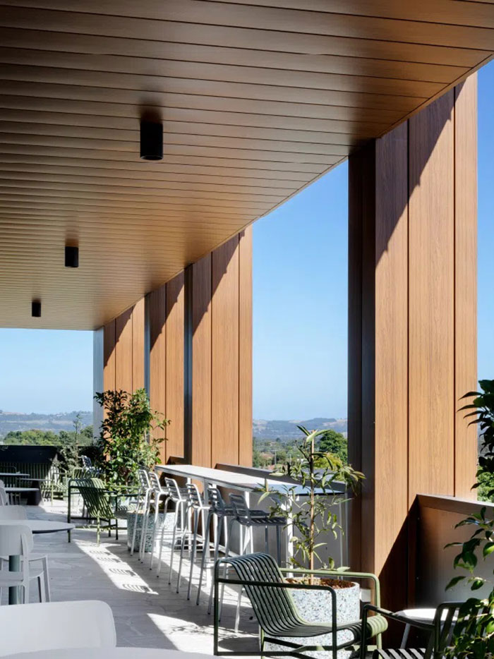 UniCote LUX Ashwood steel cladding complements building aesthetic at ...