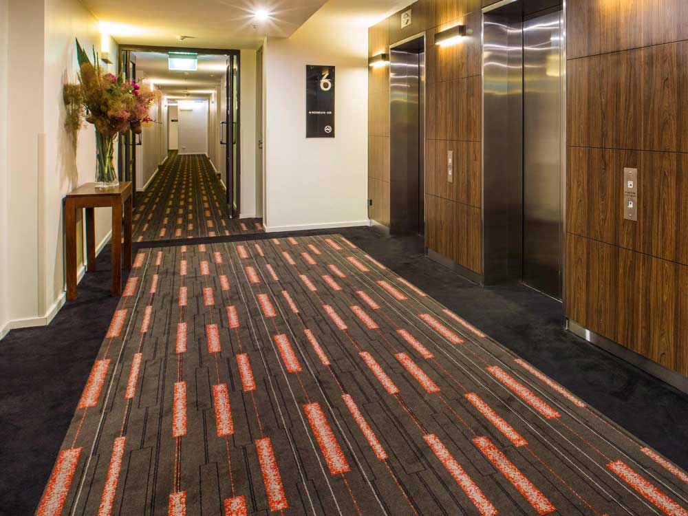 Carpet adds class, comfort and vibrant colour in Holiday Inn ...