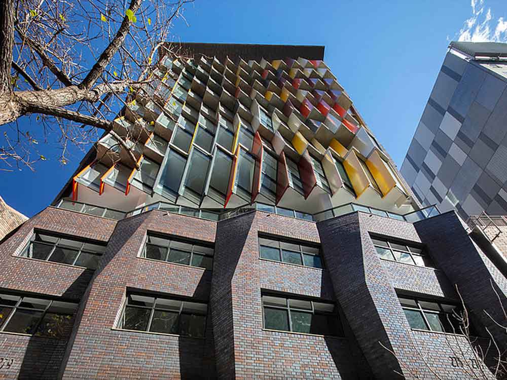 Patterned façade created with brick inlay on 14-storey Sydney building ...