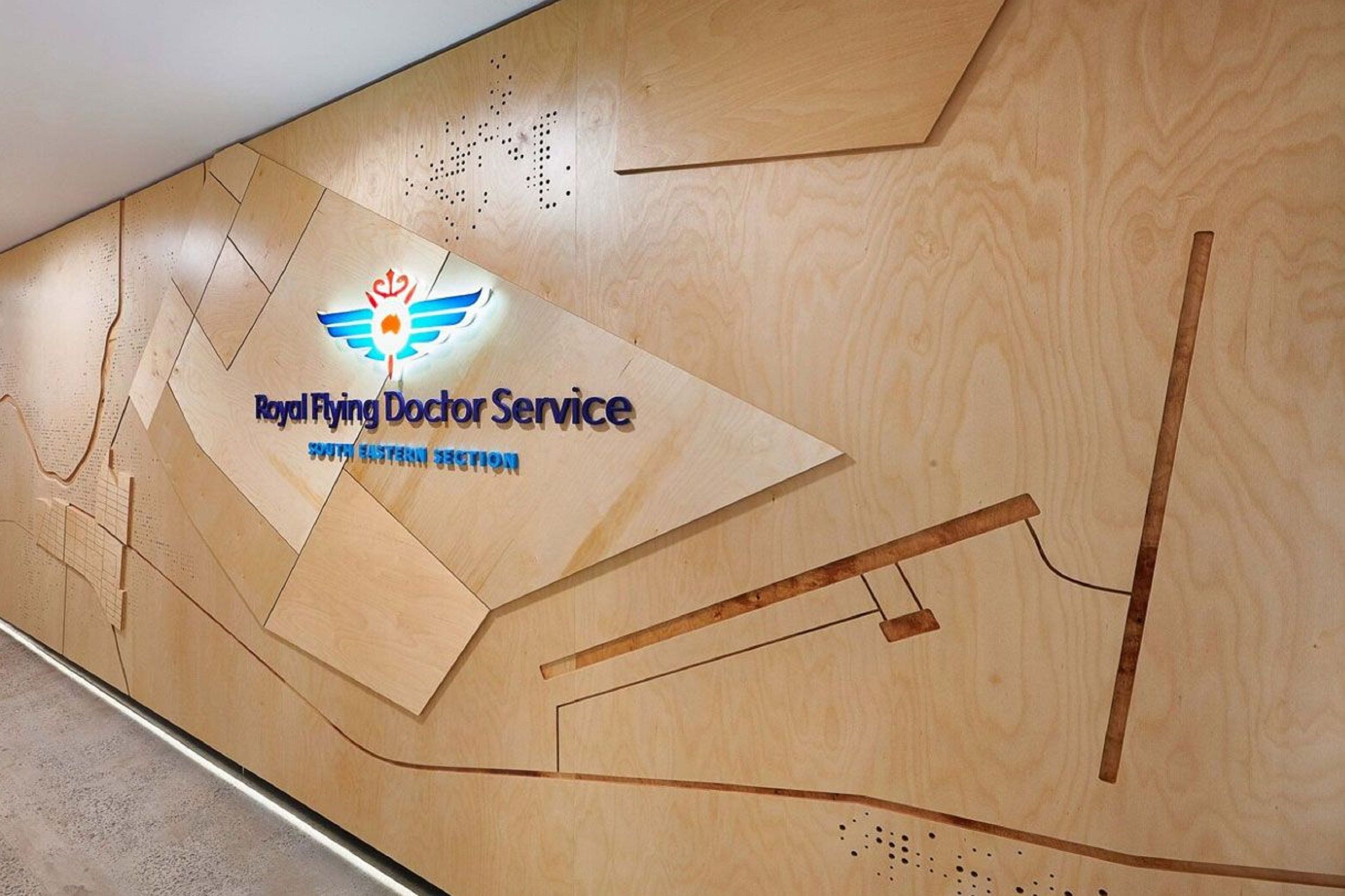 Feature wall created with Key-Ply solid plywood panels for RFDS office ...