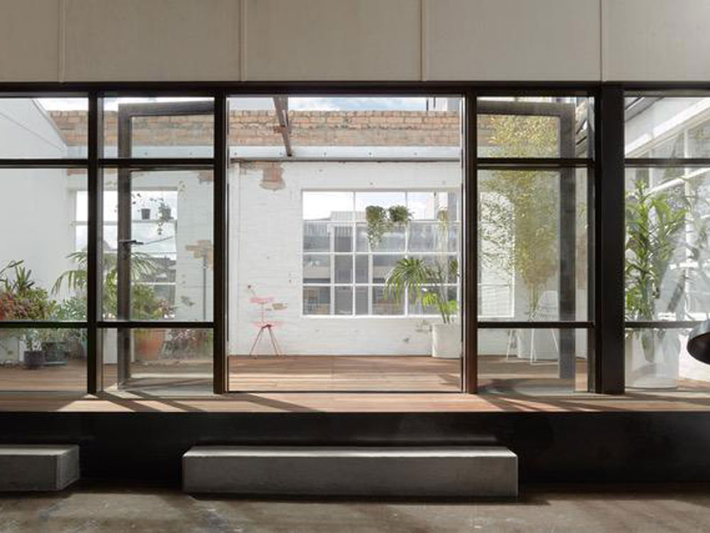 Midnight Blue brick tiles celebrate materiality in warehouse conversion ...