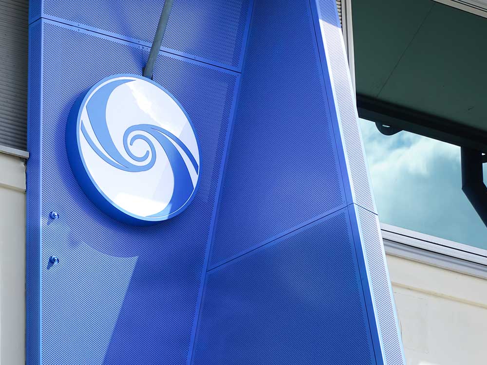 Blue perforated metal facade adds a calming welcome vibe to Nepean ...