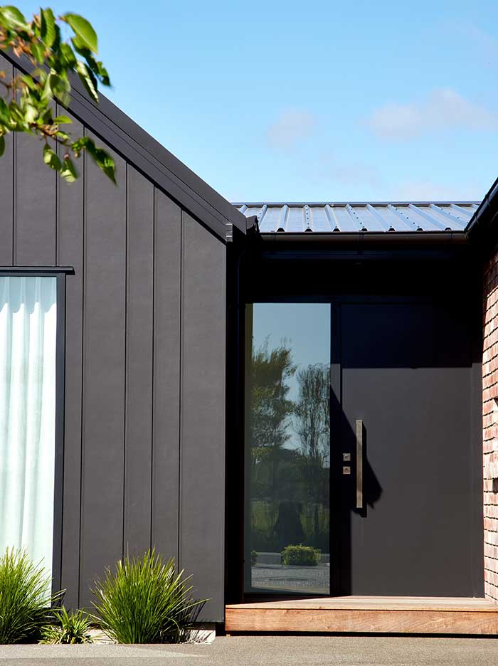 Hardie Oblique Cladding paired with recycled bricks at modern ...