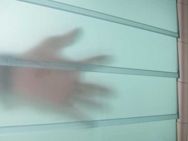 Obscure glass louvre windows ensuring privacy and ventilation in ...