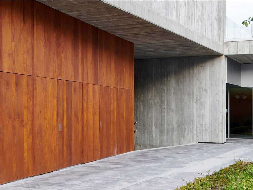 Parklex Prodema natural wood panels harmonise with concrete on school ...