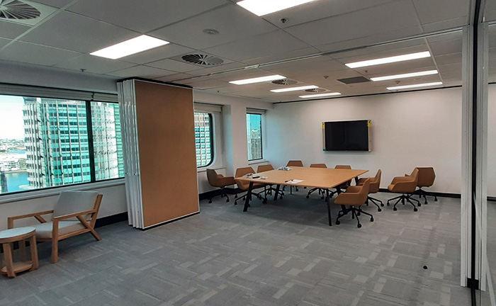 Operable walls used in Peakstone office fitout to create flexible ...