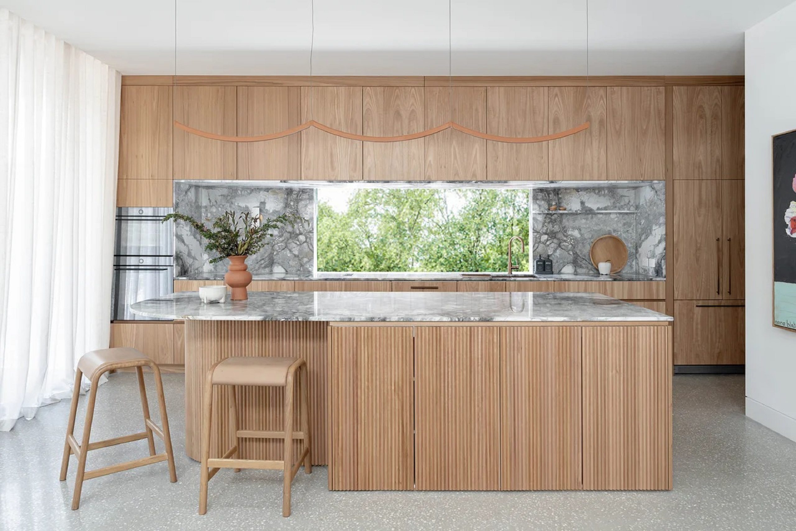Timber veneer joinery integrated throughout Project Prahran home ...
