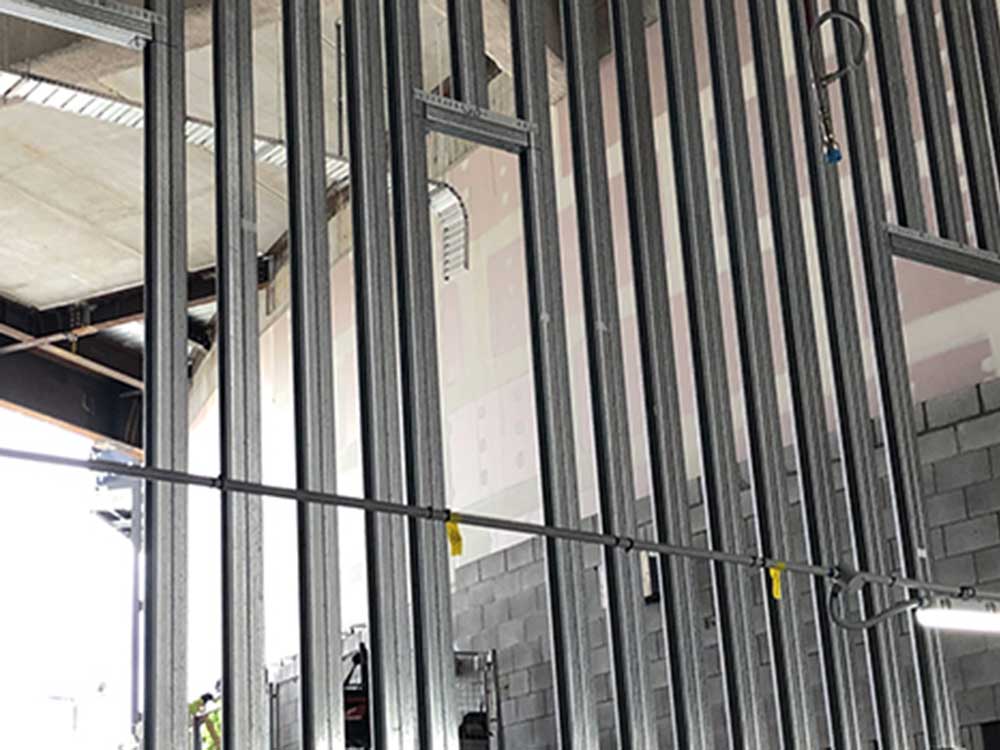 Bespoke 9m walls meet height and wind pressure challenges at Queen’s Wharf project ...