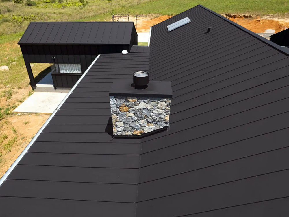 Bespoke rural house makes a bold statement with UniCote LUX steel in ...