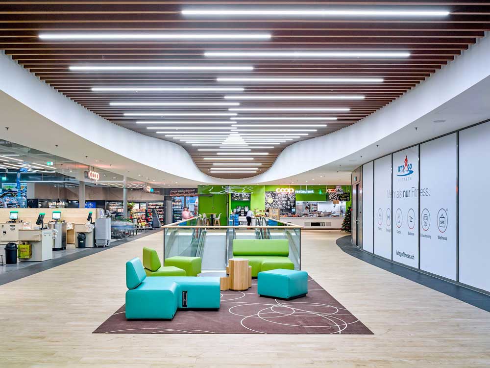 Ceilings with integrated lighting add to modern retail experience at ...