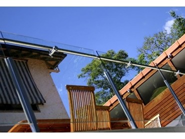 Side-mounted balustrade handrails deliver a soft and sophisticated ...