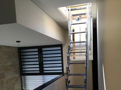Electric scissor stair helps Sydney homeowner gain access to roof ...