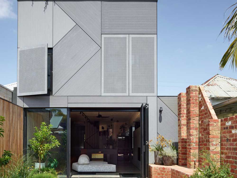 Austin Maynard Architects transforms quaint brick cottage into a multi ...