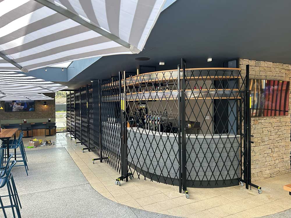 Crowd control barriers secure bar counter at Waterloo Station Hotel ...