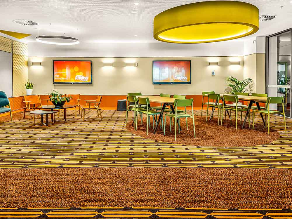 Custom carpet meets branding and wayfinding goals at hospitality ...
