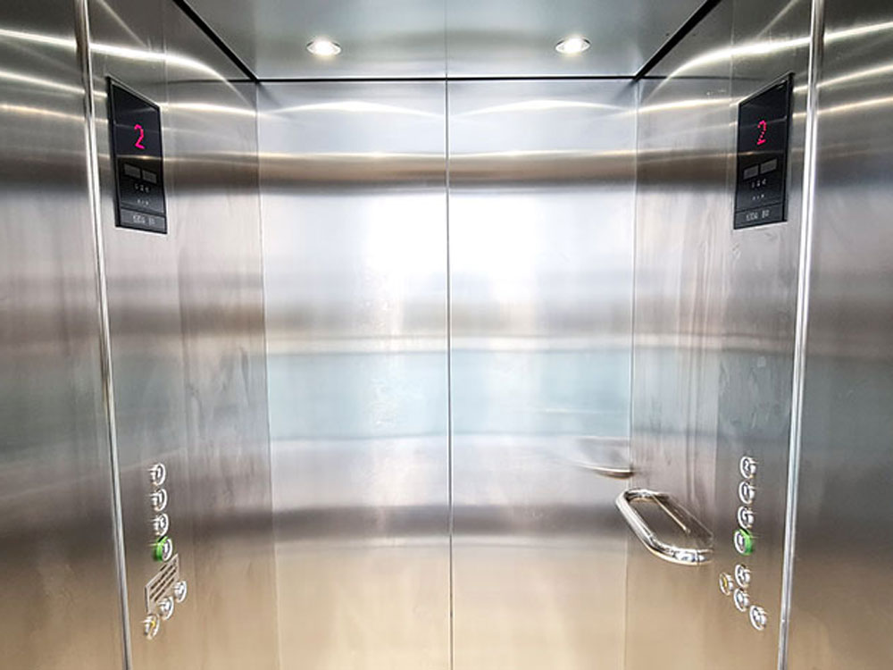 Commercial lift provides low headroom solution at Dee Why apartments ...